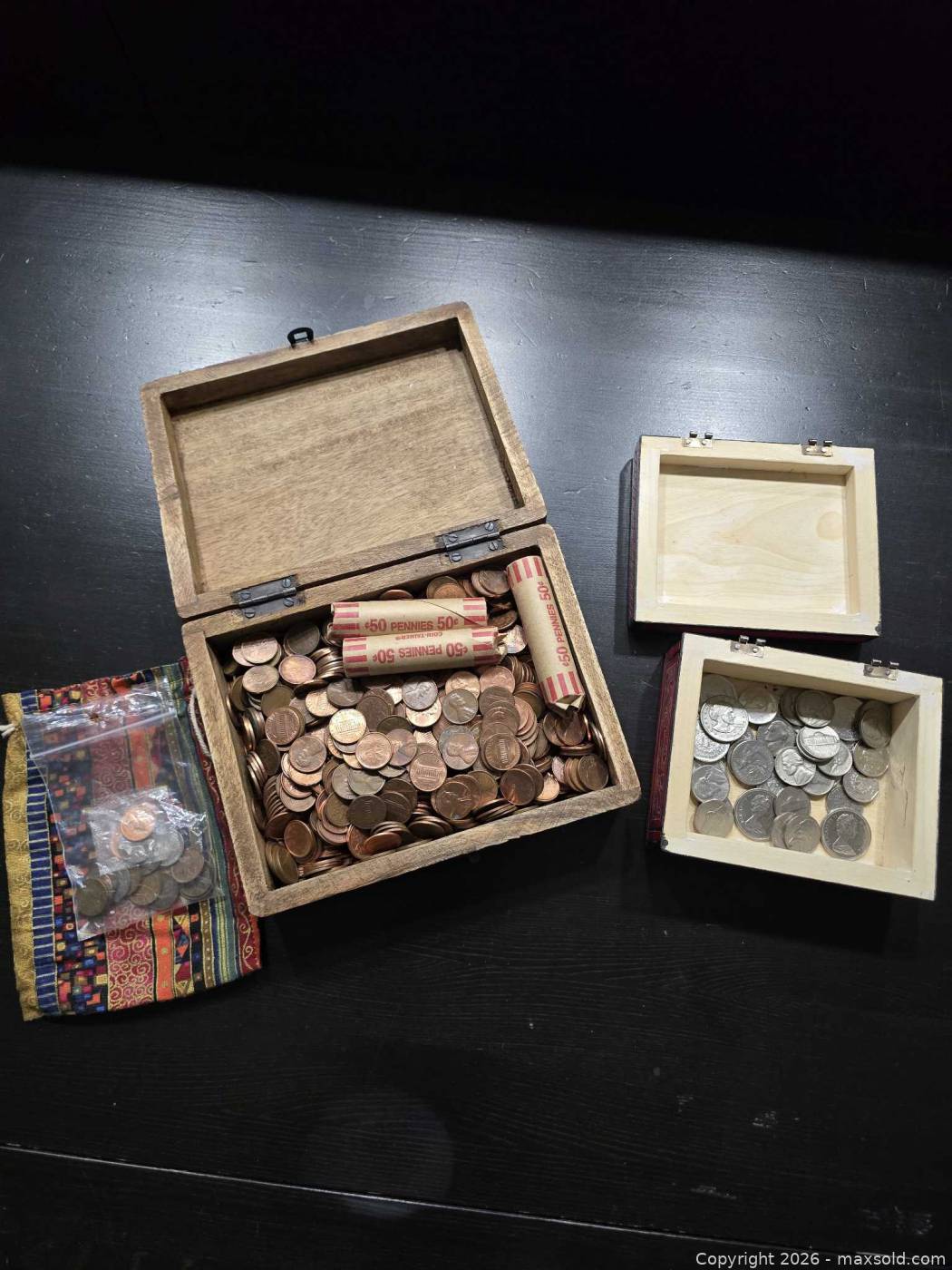 Estate coin lot with carved wooden boxes | Maxsold