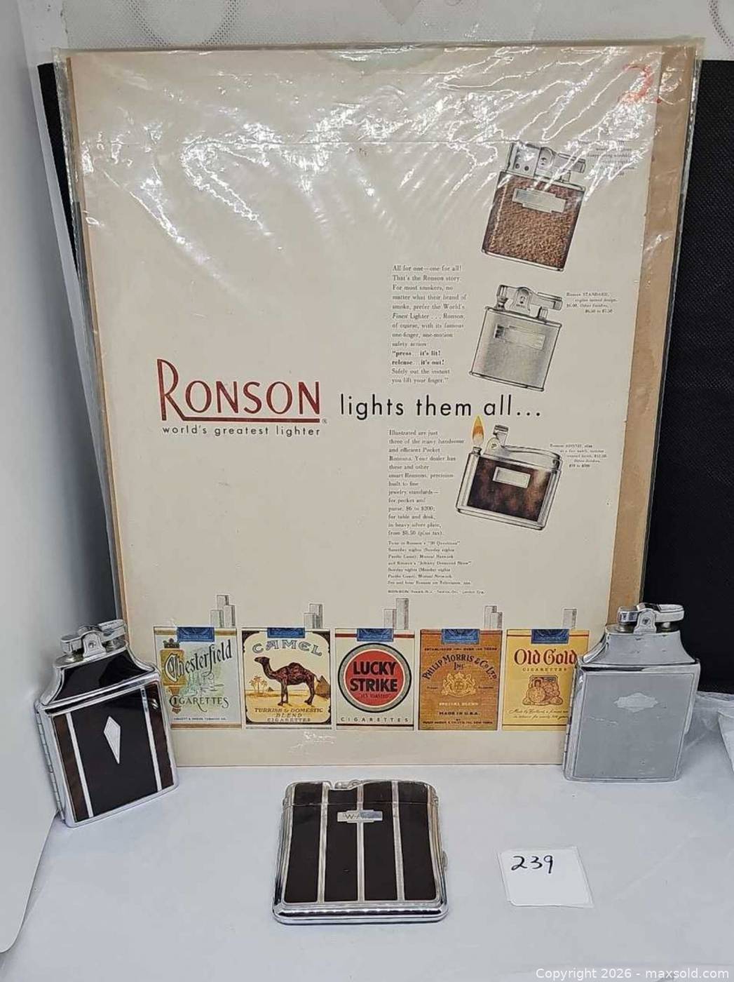 Ronson lighters, cigarette holders and ad | Maxsold