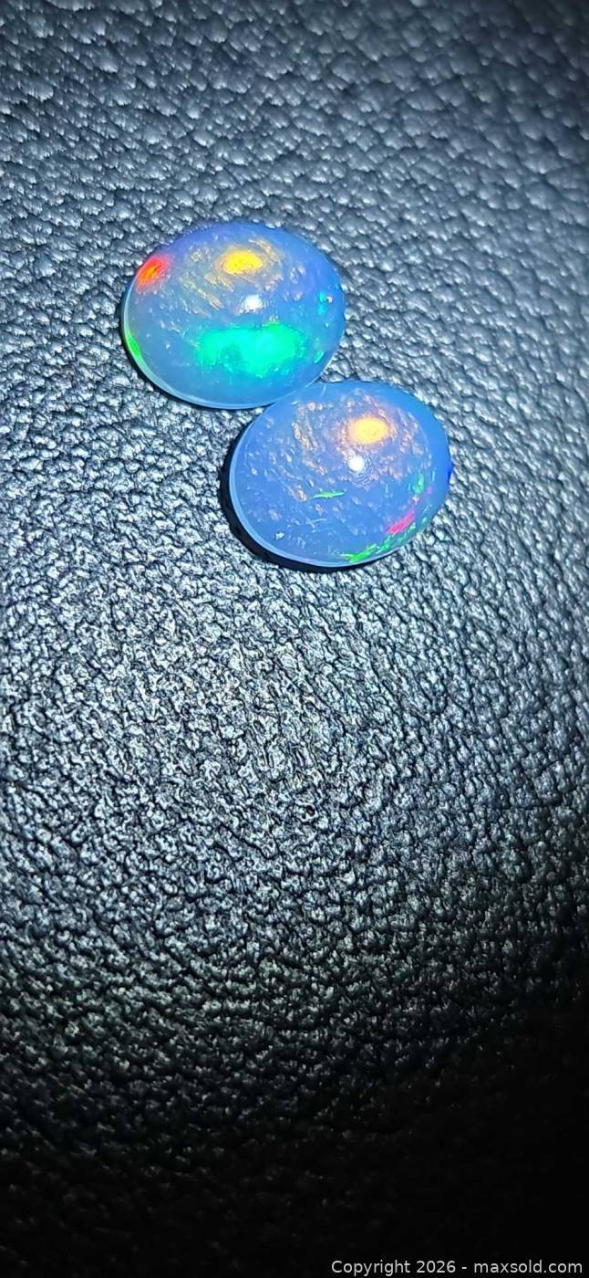 Natural Ethiopian crystal opal matched pair | Maxsold