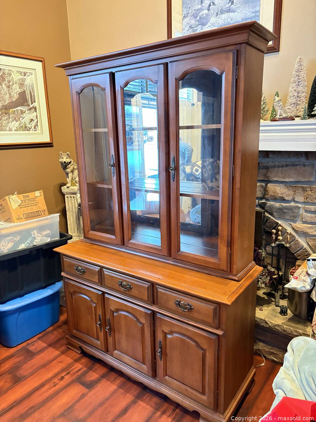 Solid maple buffet with hutch, glass doors, mirrored back | Maxsold