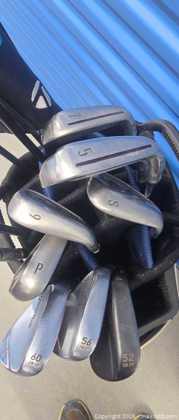 Left-handed TaylorMade golf clubs with Toronto Maple Leaf bag | Maxsold