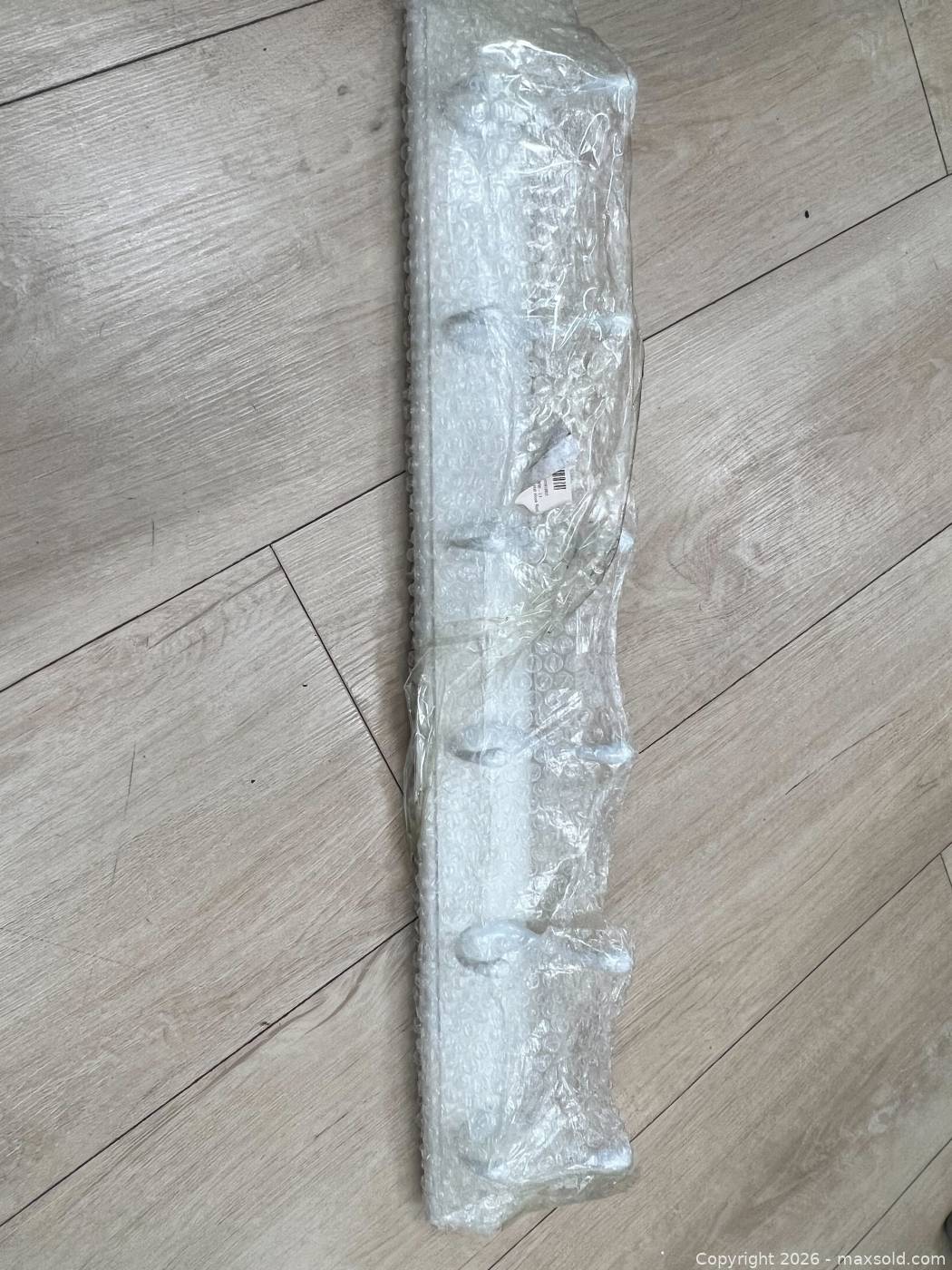 Two wall-mounted hook racks | Maxsold