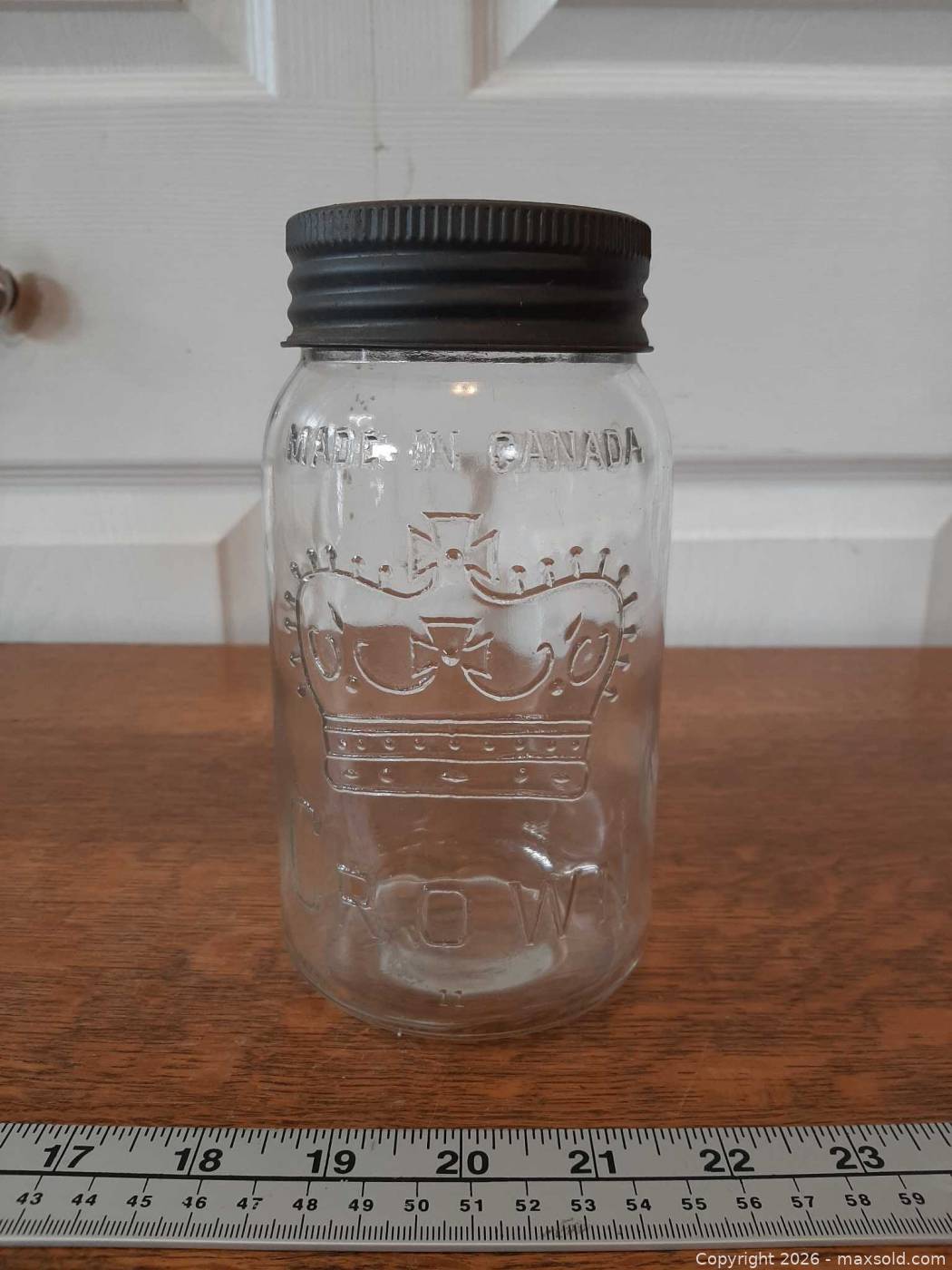 1931 Crown clear glass mason jar with black lid | Maxsold