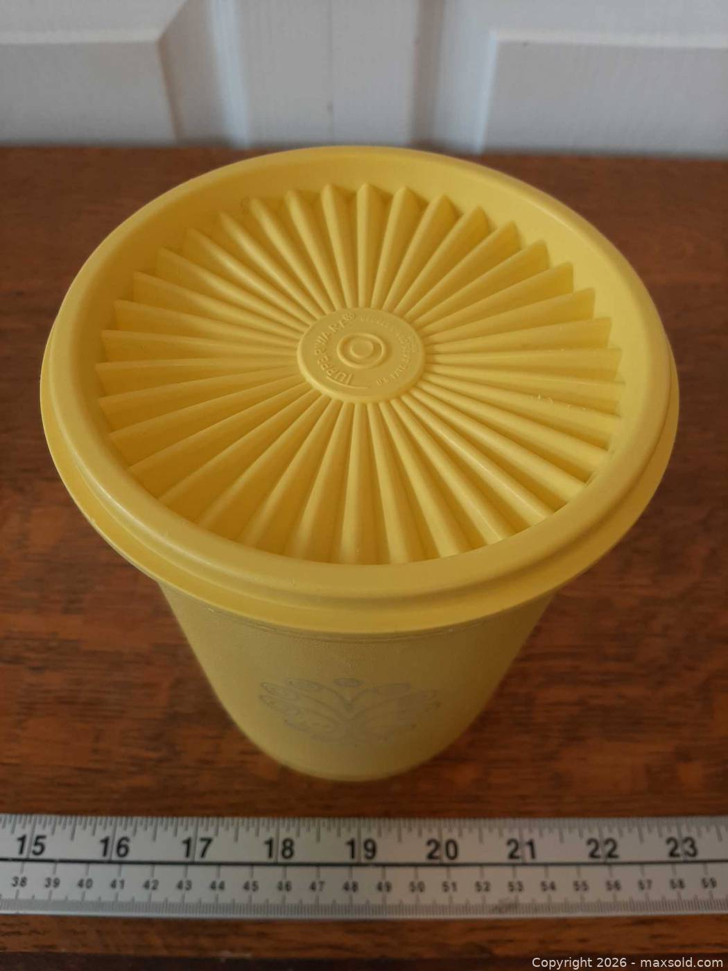 Yellow Tupperware Servalier canister | Maxsold