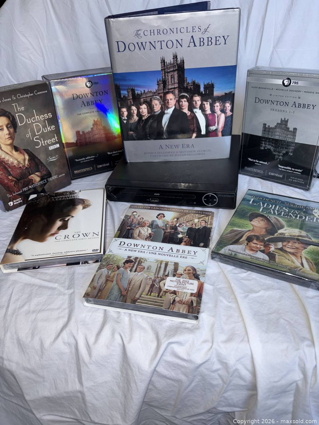 DVD sets Downton Abbey, Crown plus Sylvania player | Maxsold