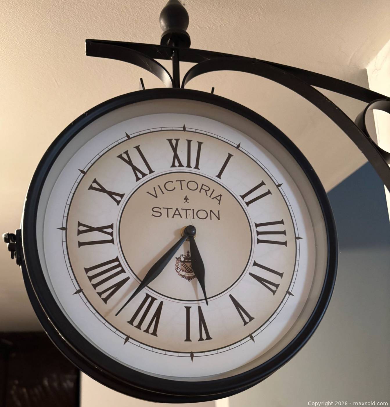 Victoria Station Wall Clock on Metal Bracket | Maxsold