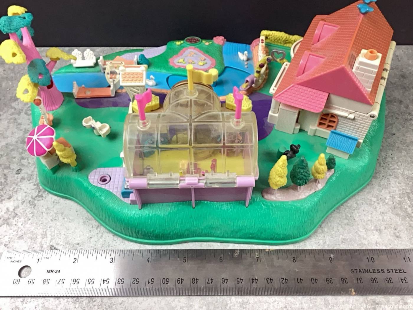1996 Polly Pocket Polly's Boutique Playset with Polly figure | Maxsold