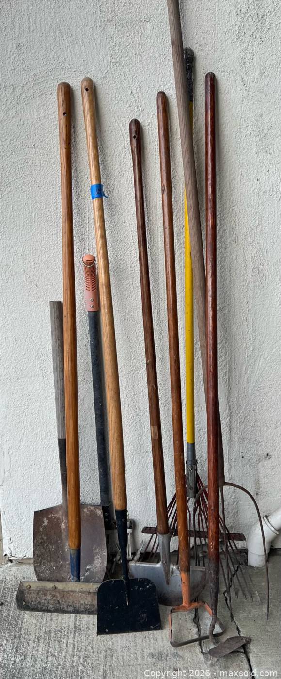 Assorted long-handled garden tools | Maxsold