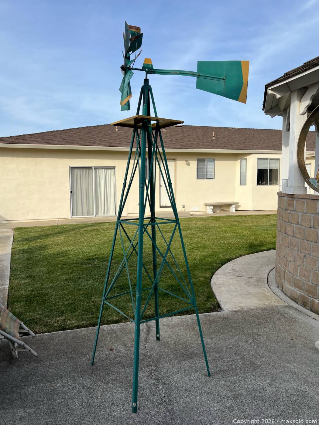 Metal garden windmill, approx 8’4” tall | Maxsold