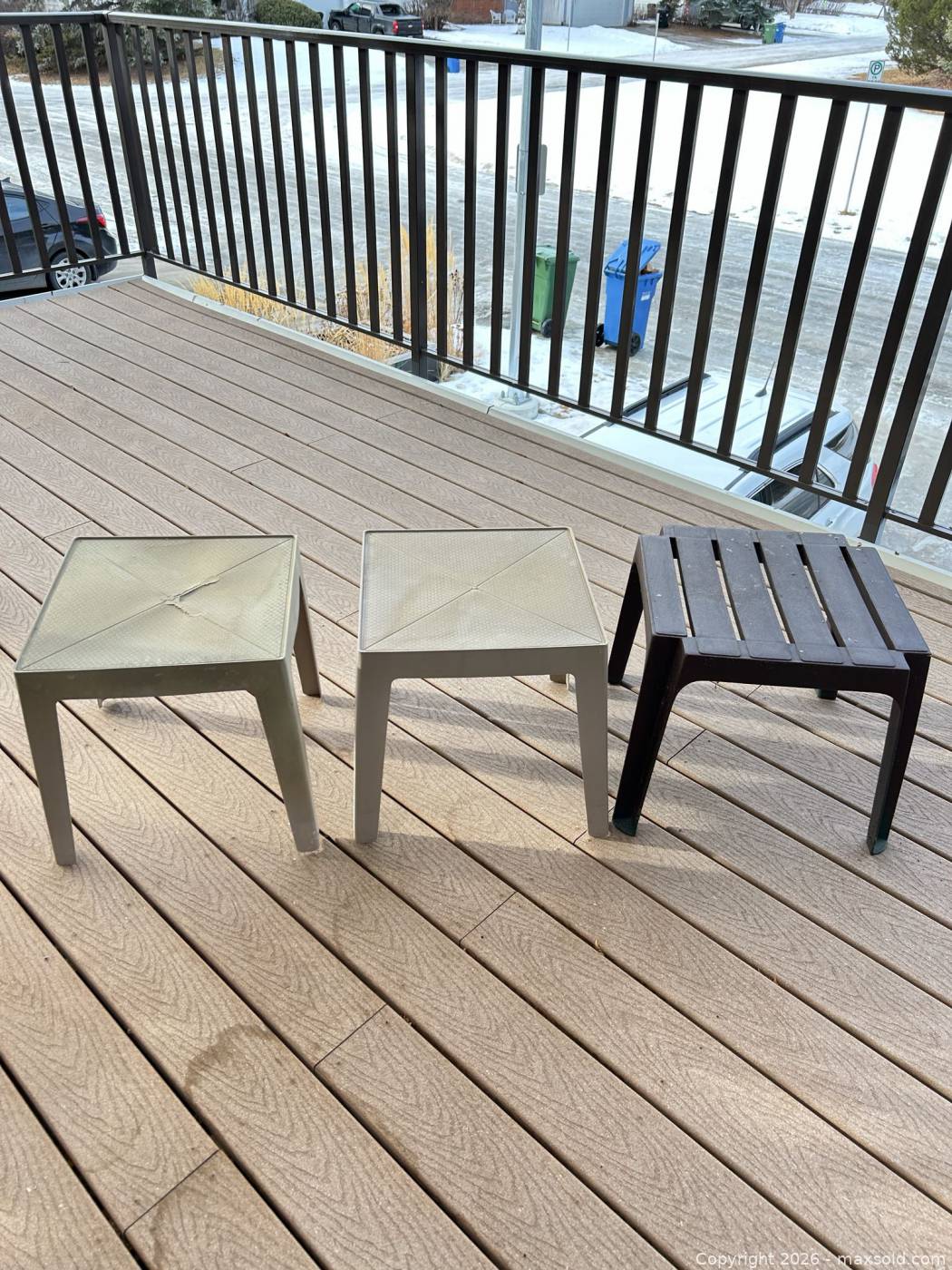 Three plastic resin outdoor side tables | Maxsold