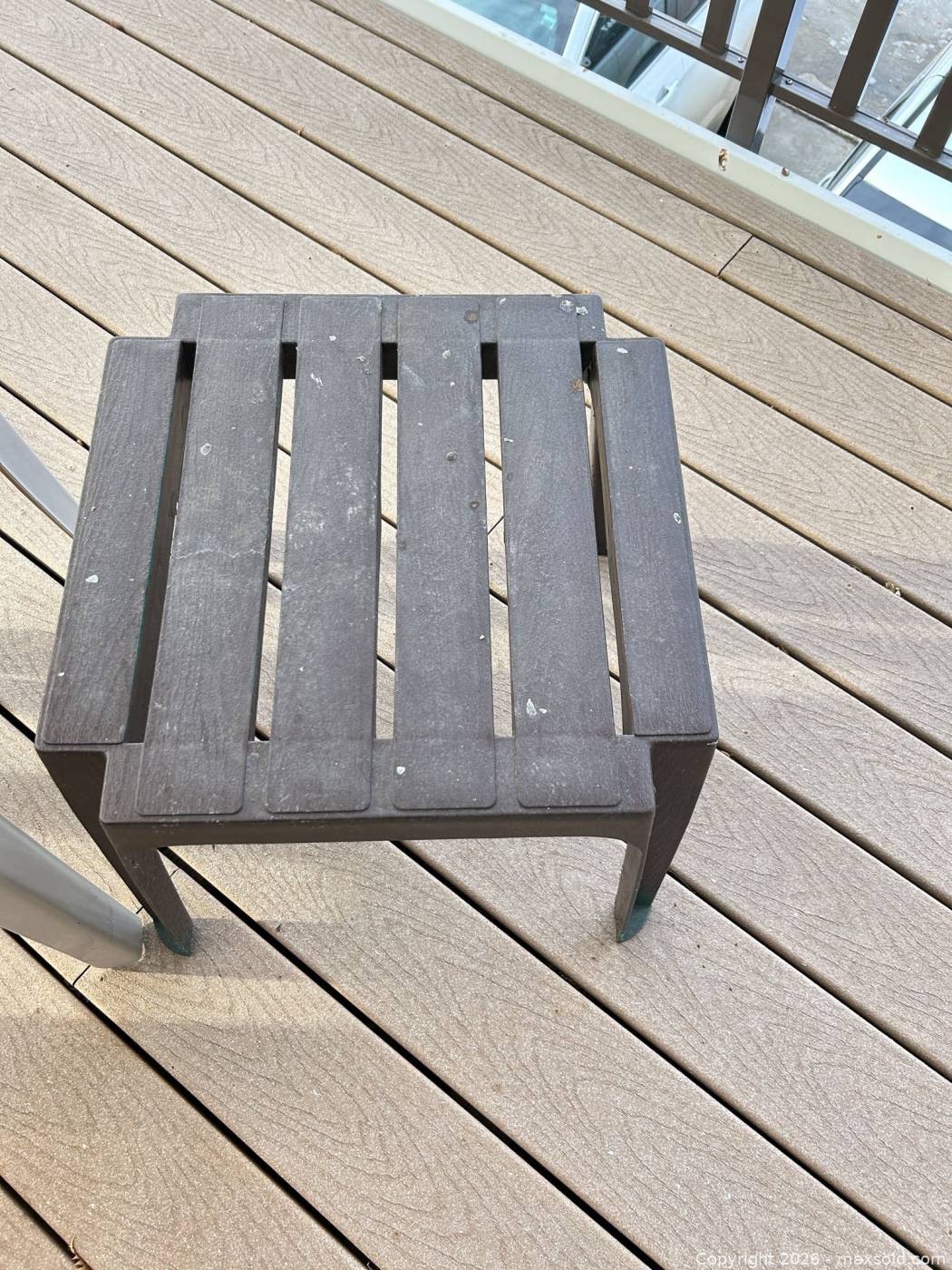 Three plastic resin outdoor side tables | Maxsold