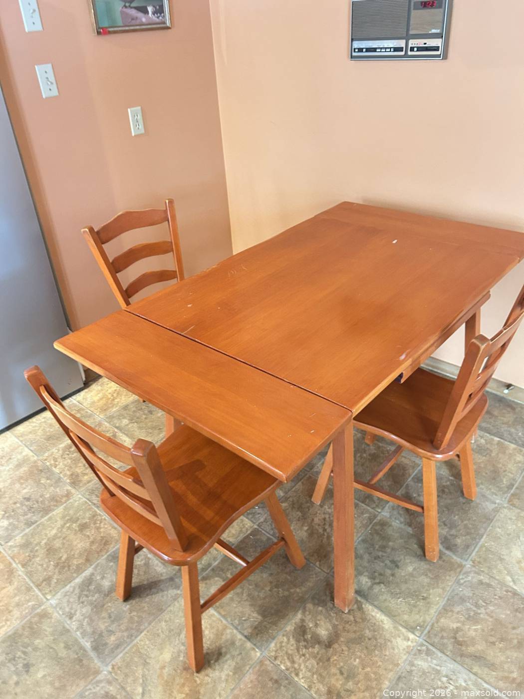 solid wood cherry dining table with 4 chairs | Maxsold