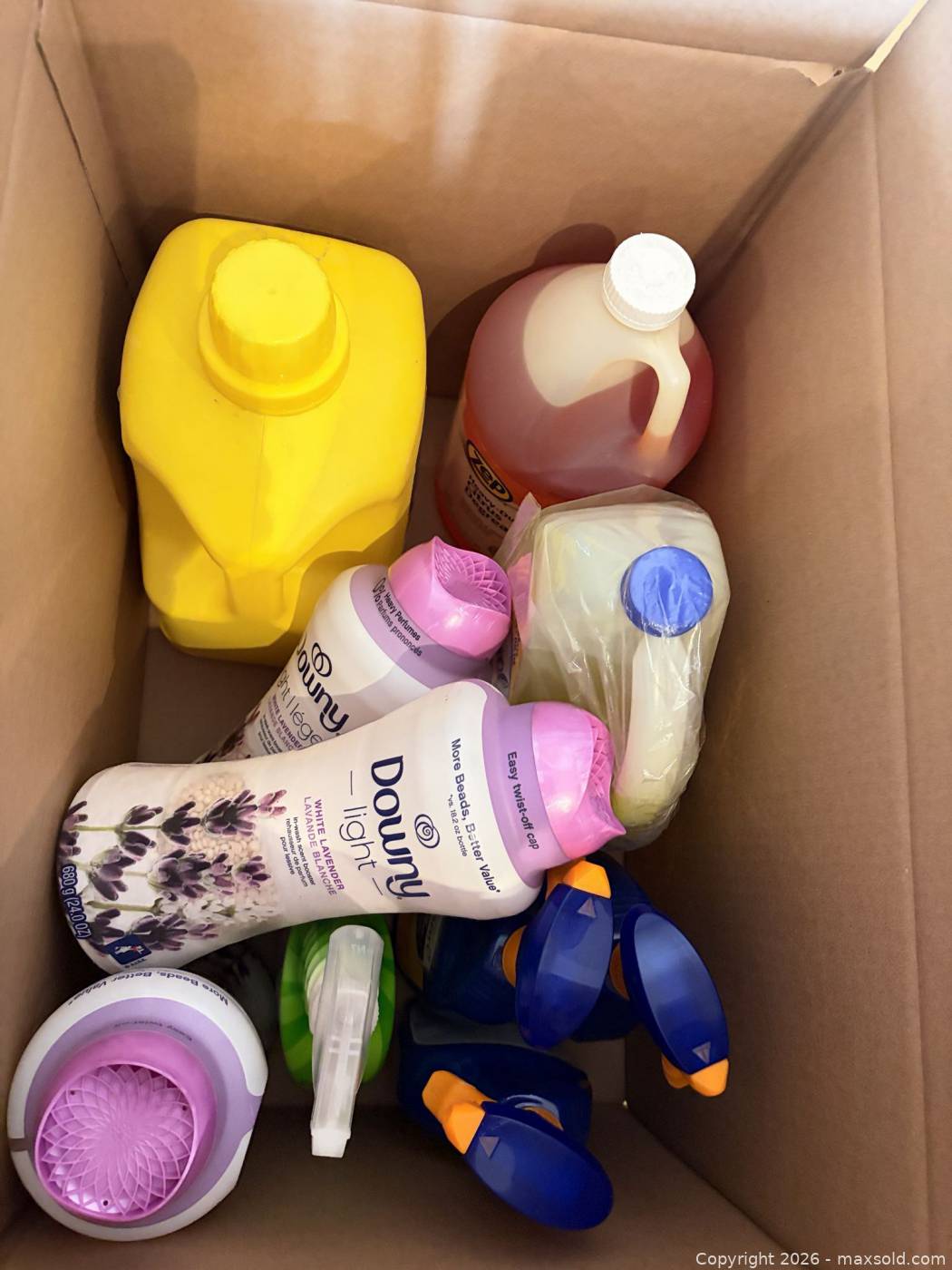 Assorted cleaning and laundry supplies | Maxsold