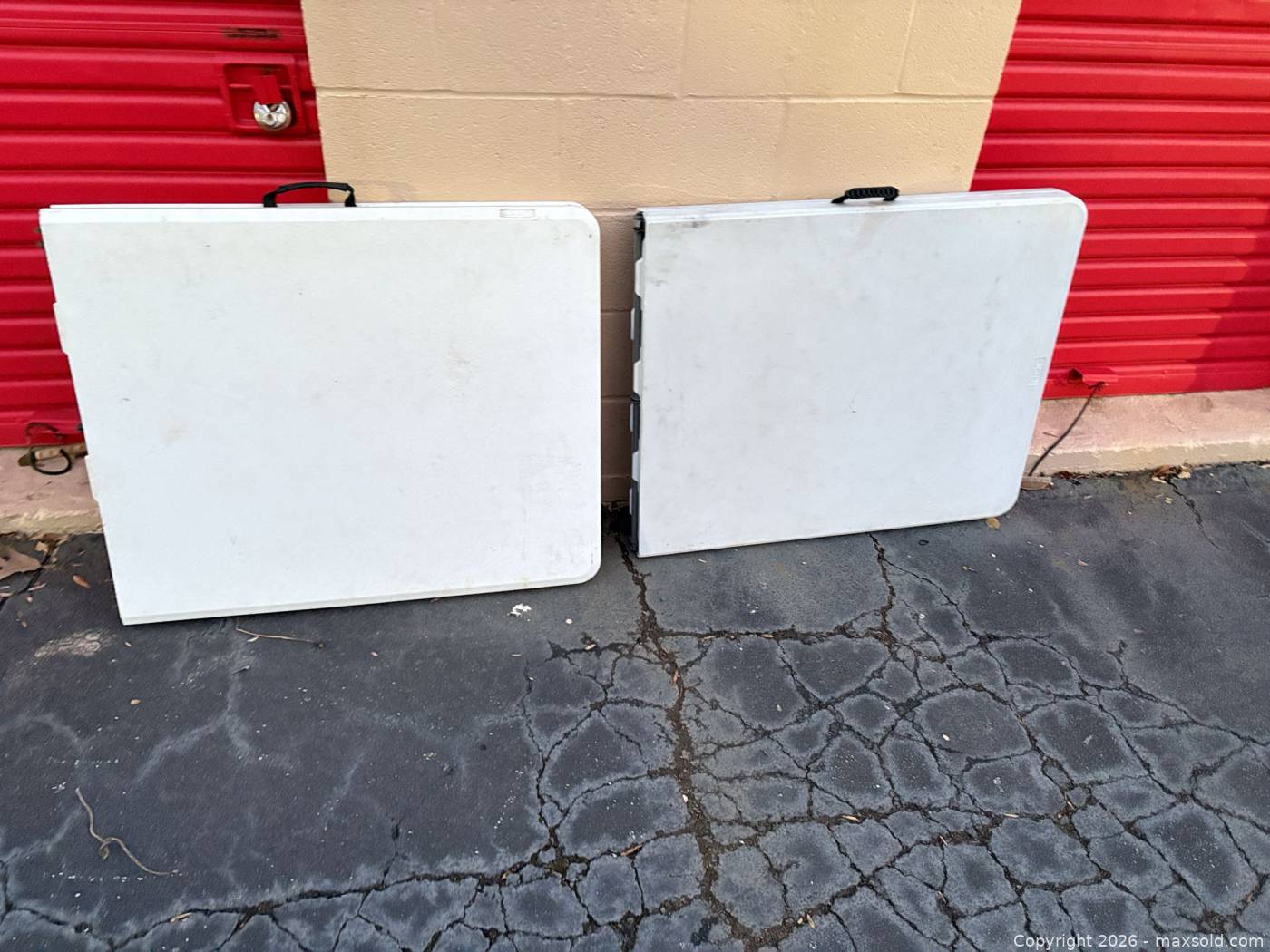 Set of two white rectangular folding tables | Maxsold