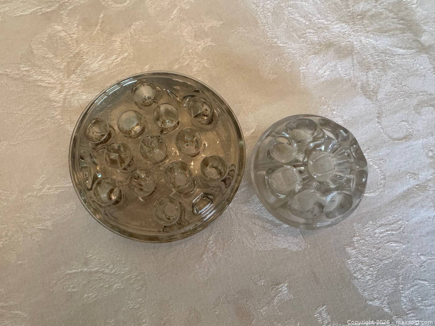 Two Clear Glass Flower Frogs | Maxsold