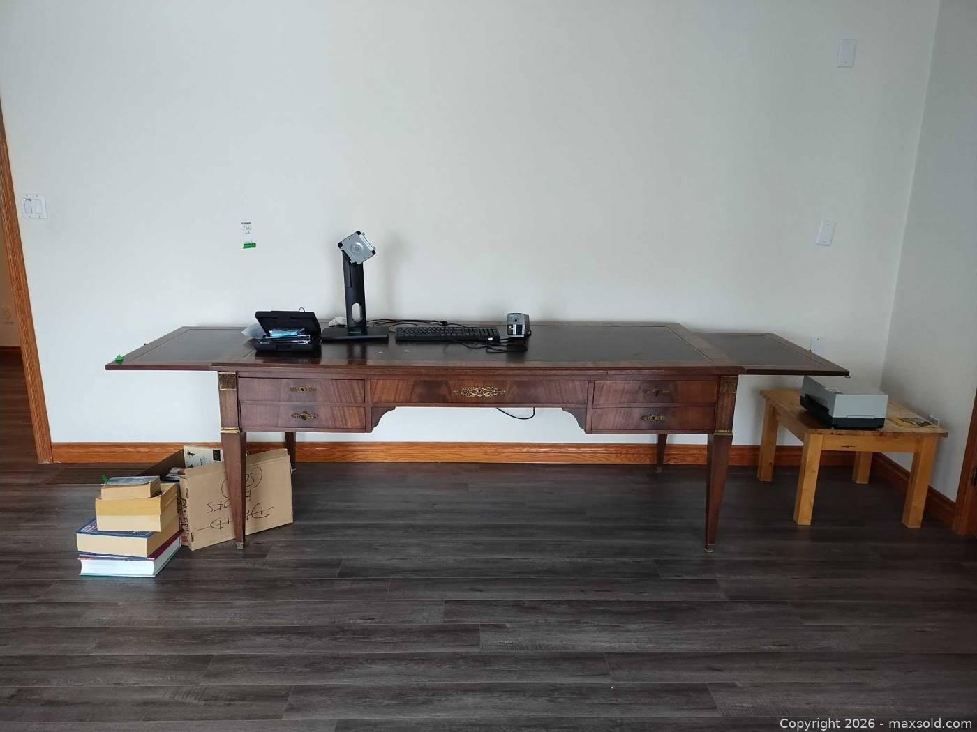 Styles de France executive desk with leather inlay | Maxsold