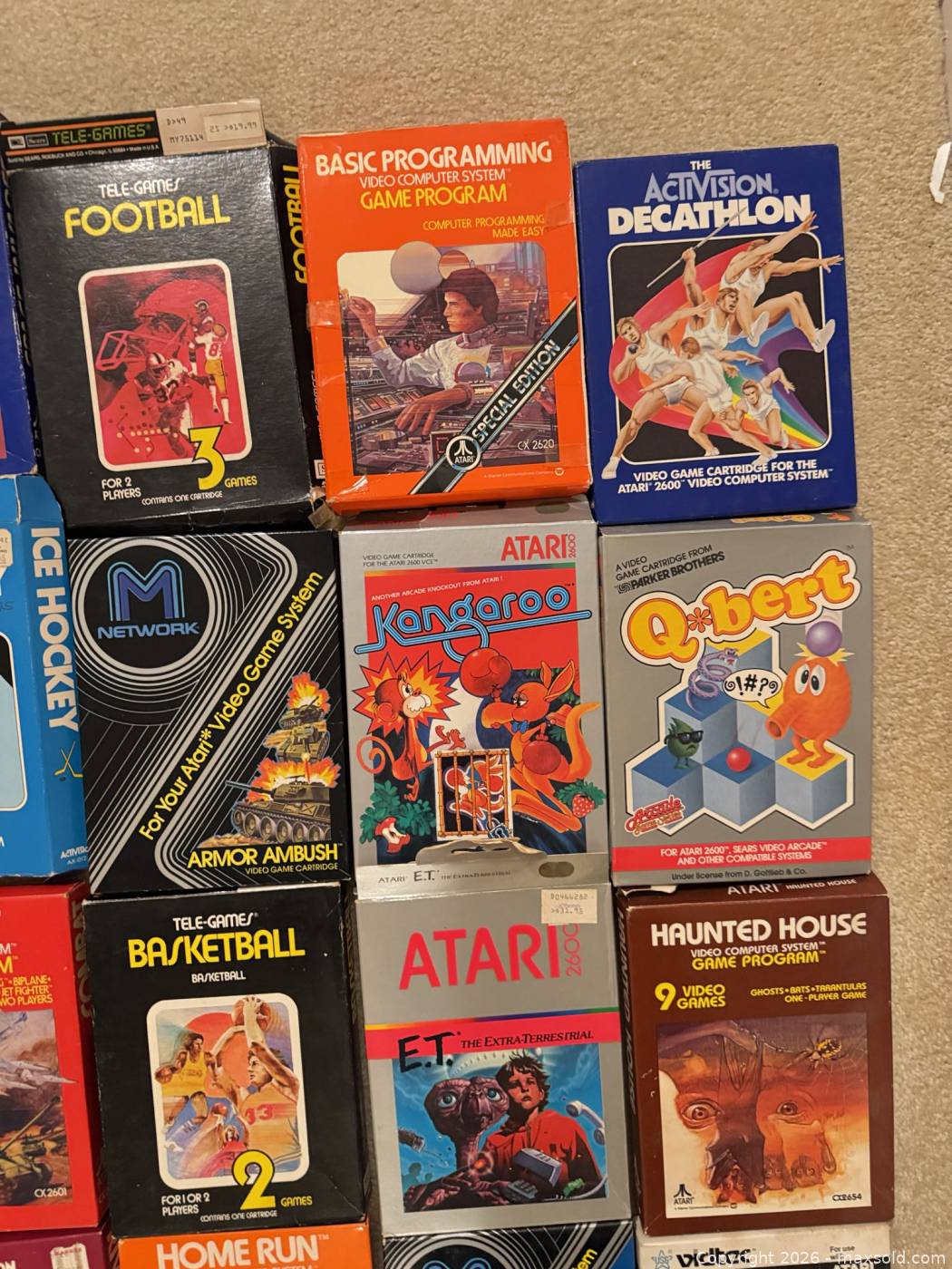 Approx. 35 empty Atari-era video game boxes | Maxsold