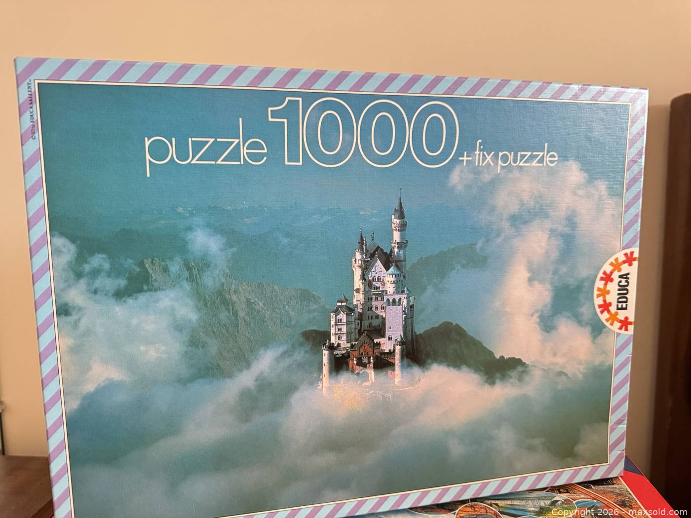 Lot of three 1000-piece jigsaw puzzles | Maxsold
