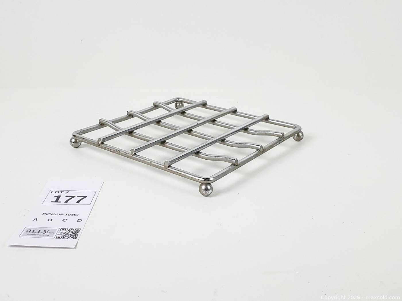 Square Metal Grid Trivet With Ball Feet | Maxsold