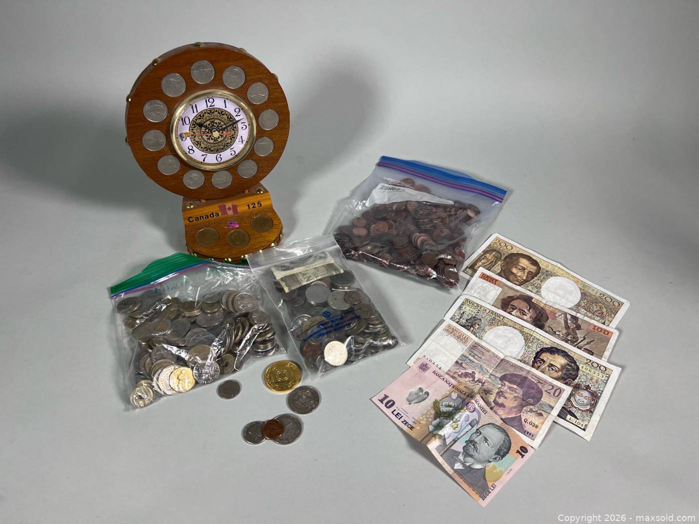 Assorted World Coins, Banknotes, Quartz Mantle Clock | Maxsold