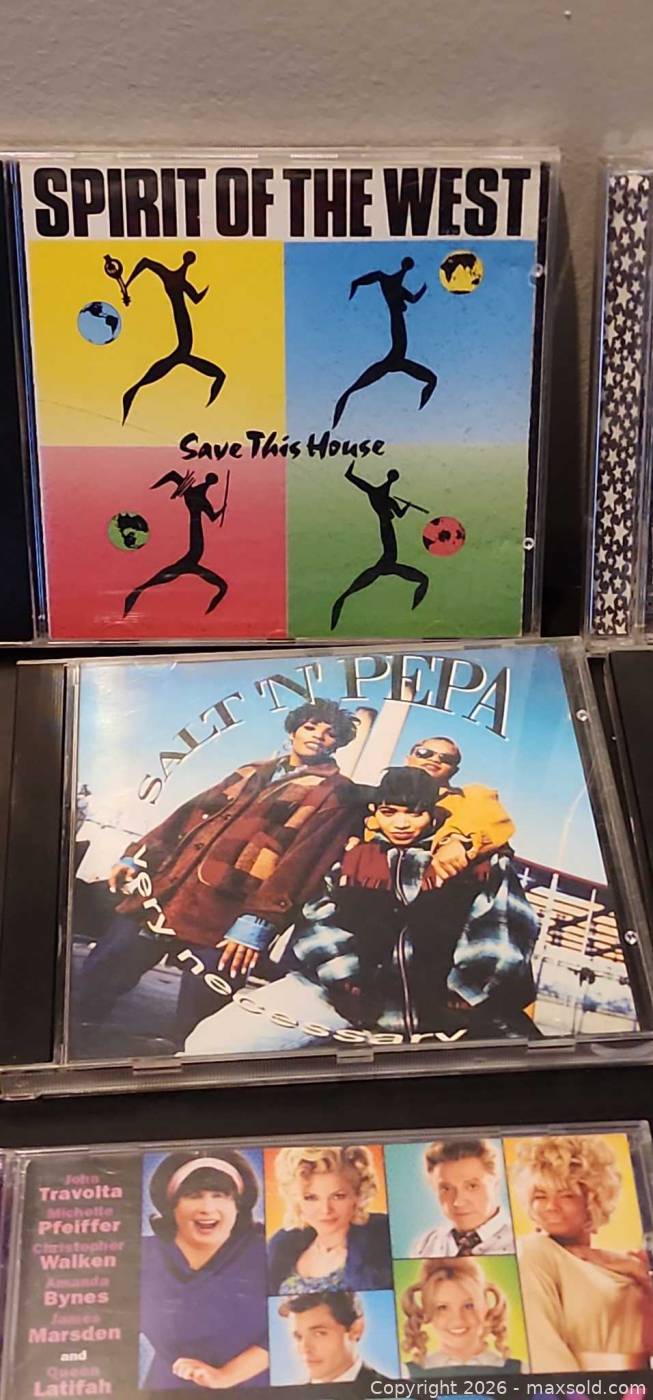 12 1990s era music CDs | Maxsold