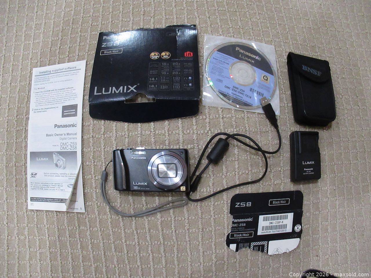 Panasonic Lumix digital cameras with accessories and binoculars | Maxsold