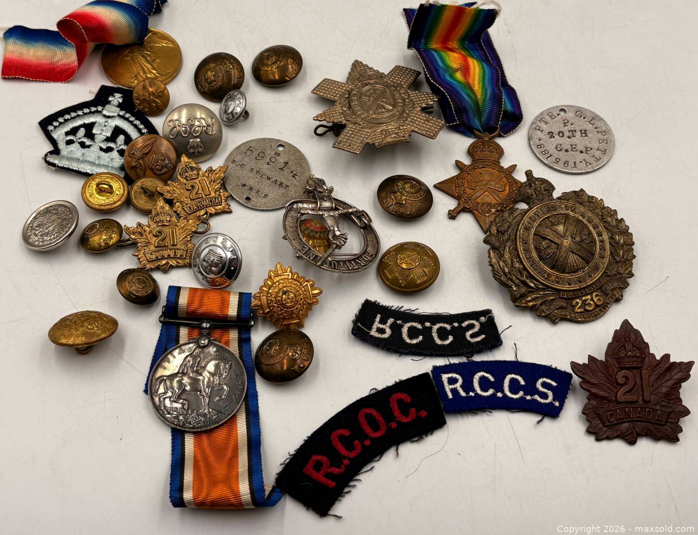 Canadian WWI medals, badges, buttons lot | Maxsold