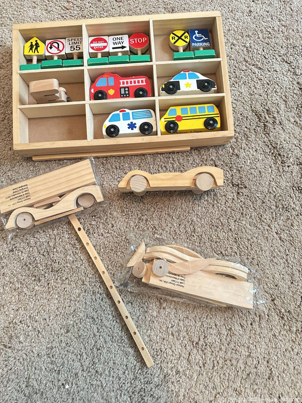 Wooden toy vehicle and road sign set in tray | Maxsold