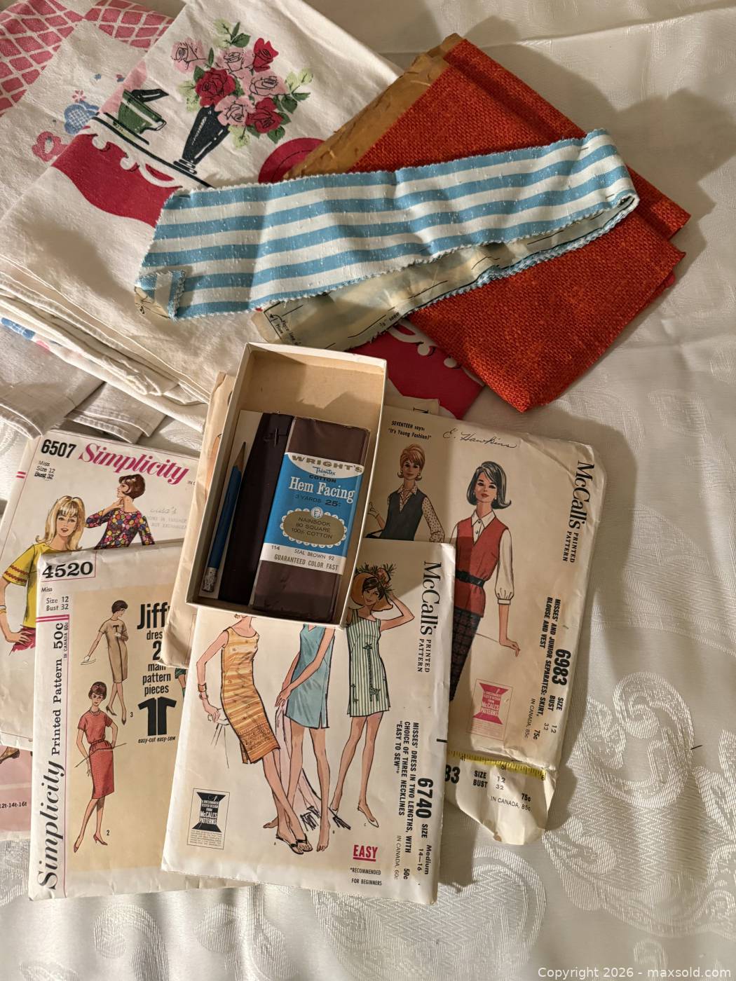 Vintage sewing patterns, fabric and notions | Maxsold