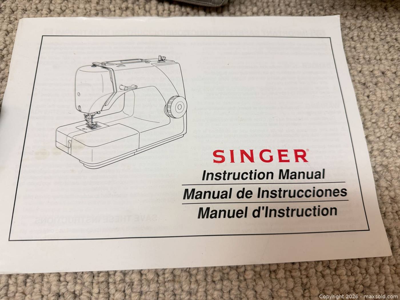 Singer portable sewing machine with accessories | Maxsold
