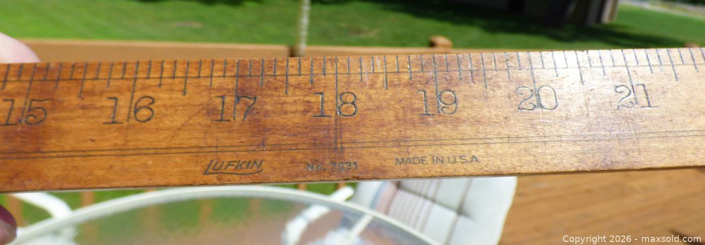 11 vintage wooden advertising yardsticks | Maxsold