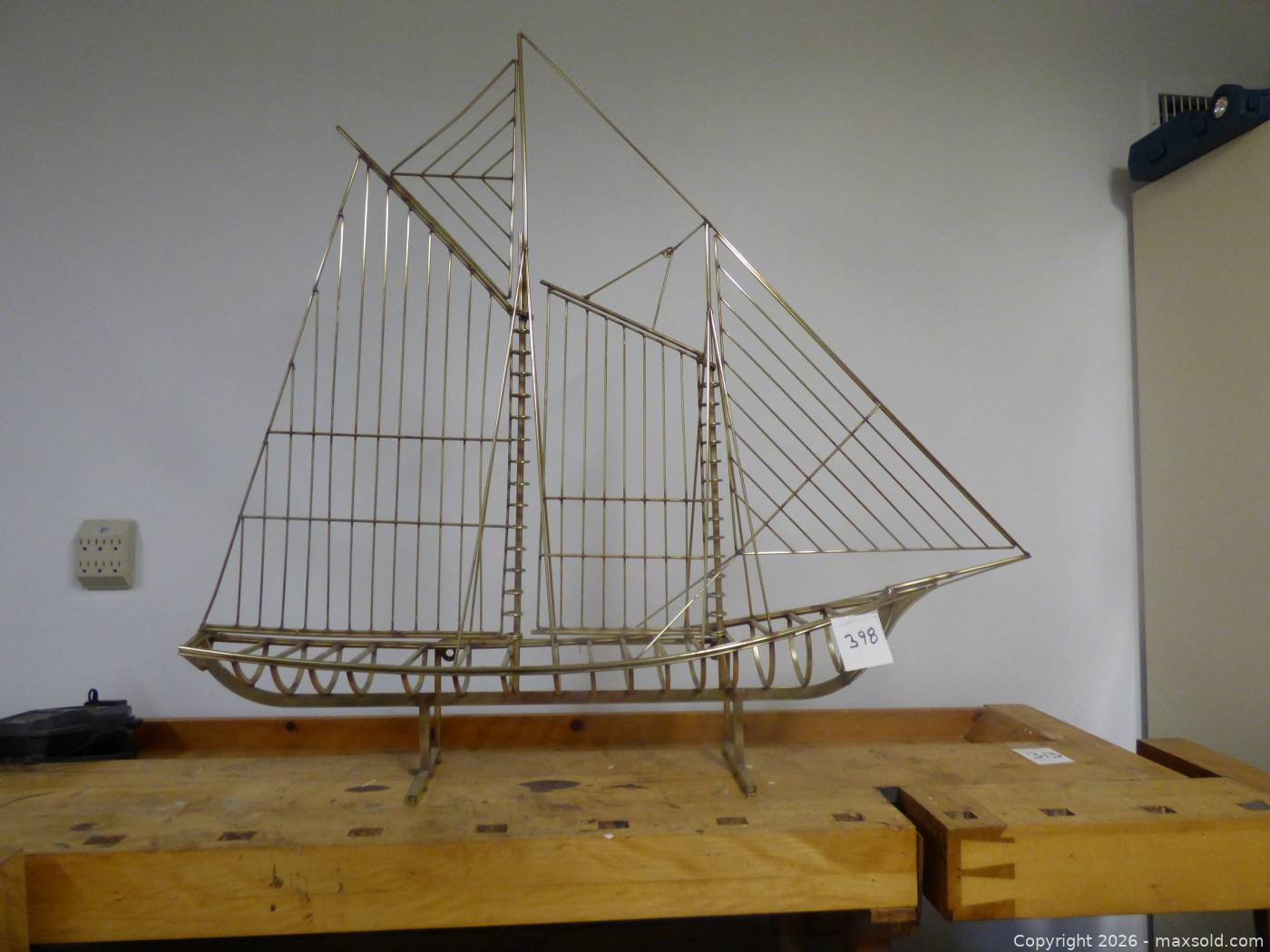 Brass wire sailing ship sculpture | Maxsold