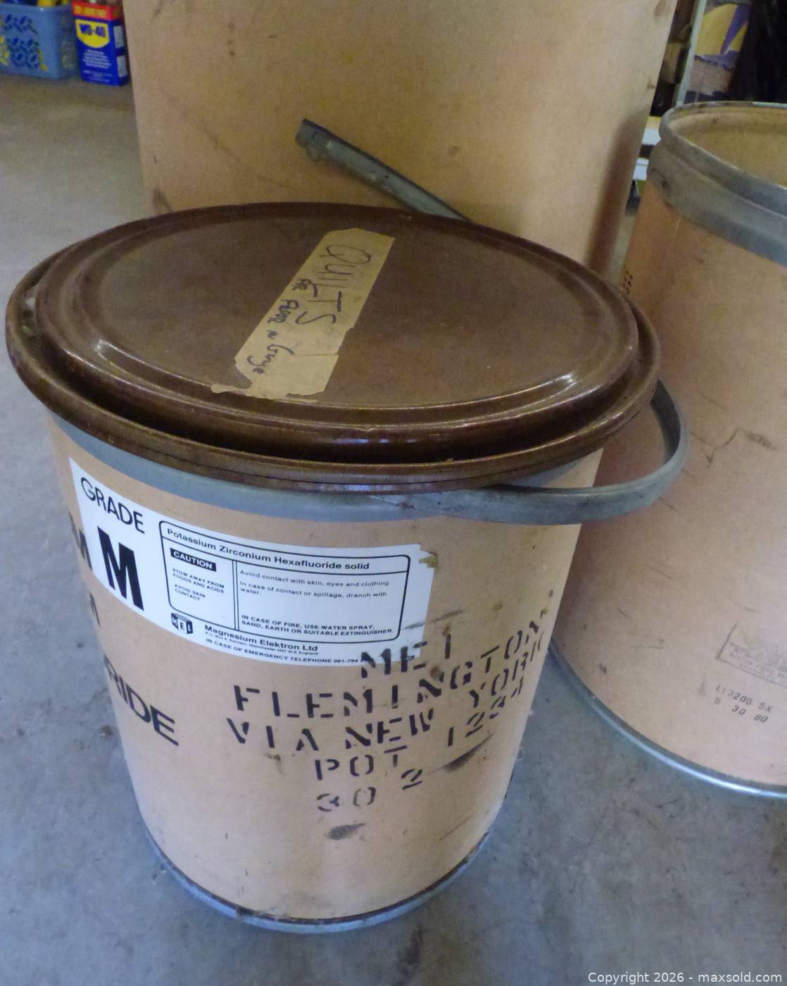 Three round fiber storage drums | Maxsold