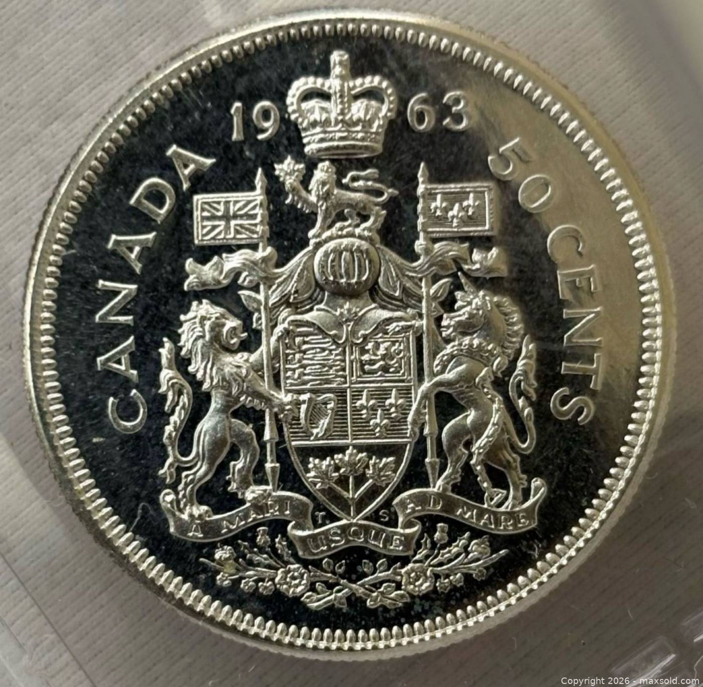 1963 Canada 50-cent silver coin graded PL-65 | Maxsold