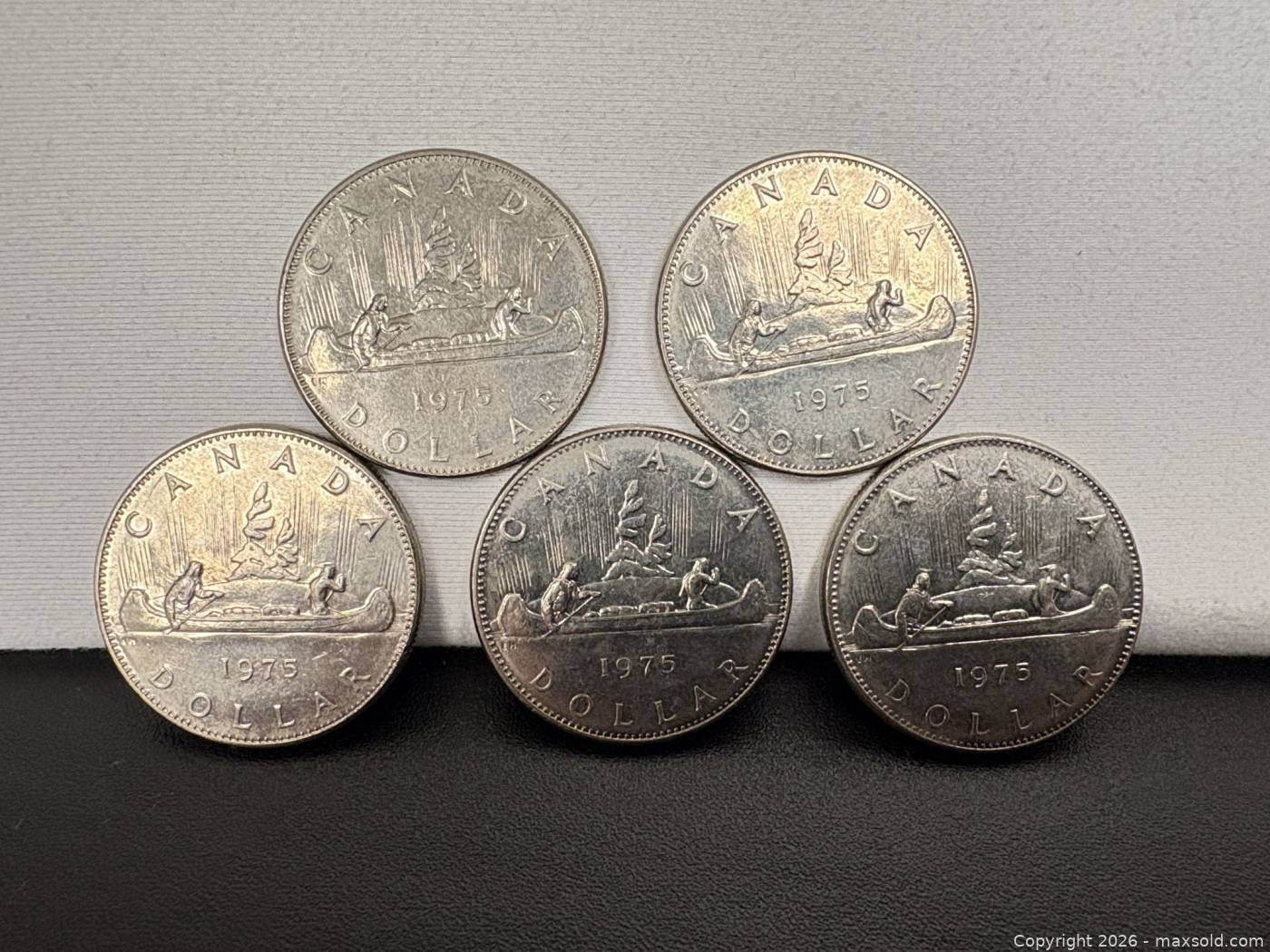 Five 1975 Canadian Voyageur one-dollar coins | Maxsold