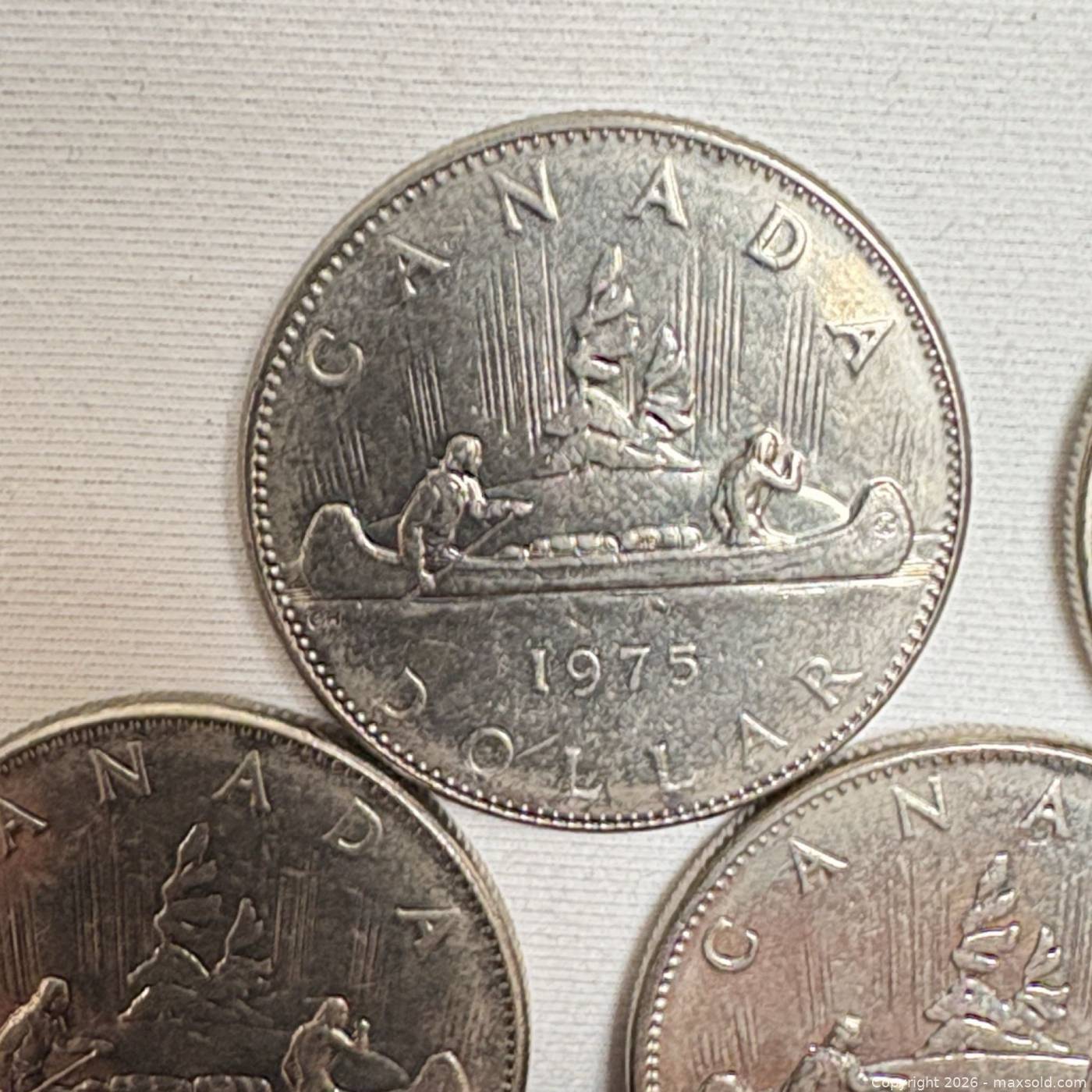 Five 1975 Canadian Voyageur one-dollar coins | Maxsold