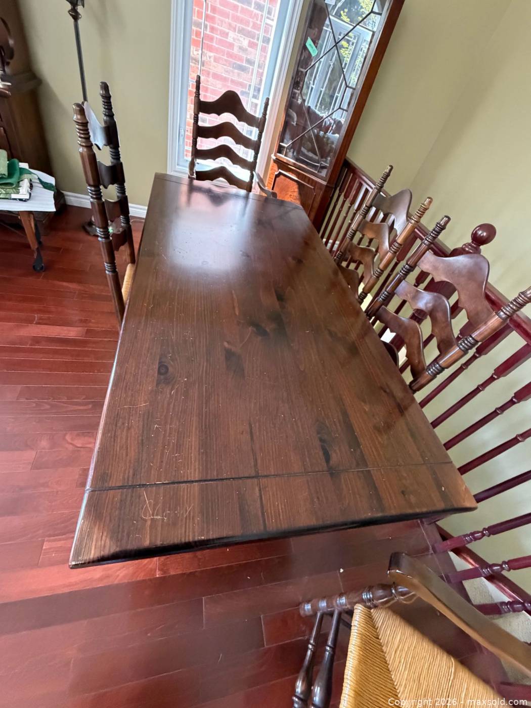 Ethan Allen solid wood dining table with five chairs | Maxsold