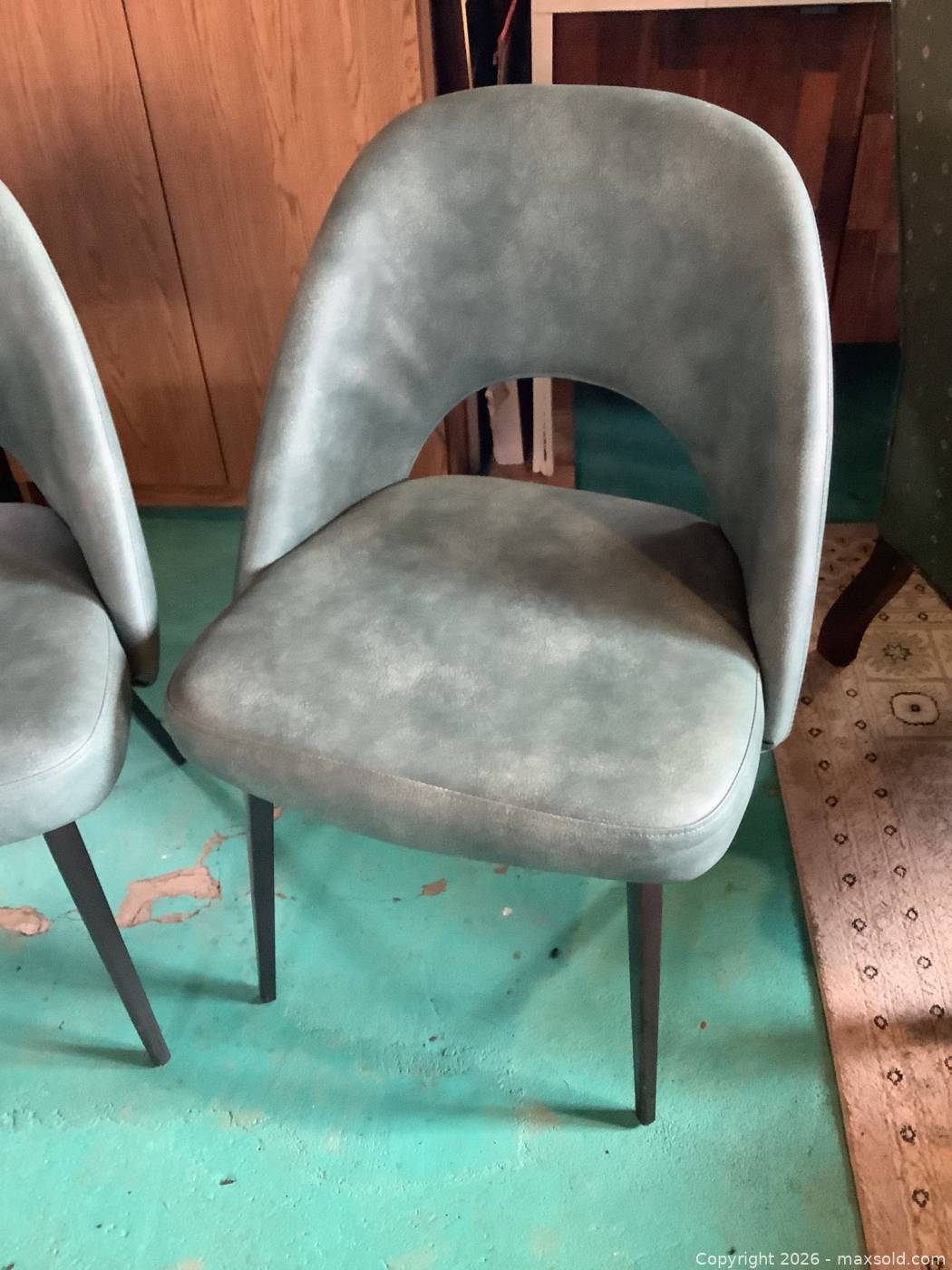 Pair of green open-back accent chairs | Maxsold