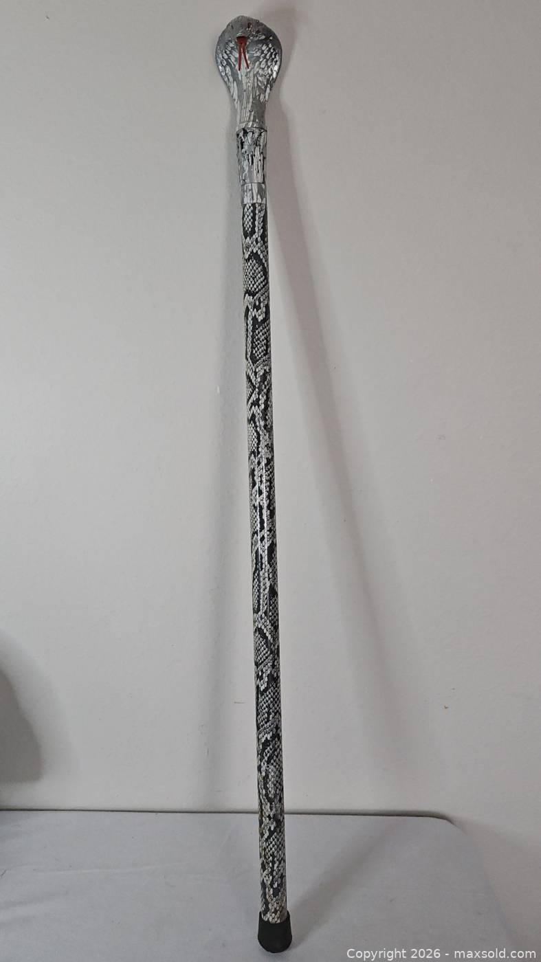 Metal cobra-head sword cane | Maxsold