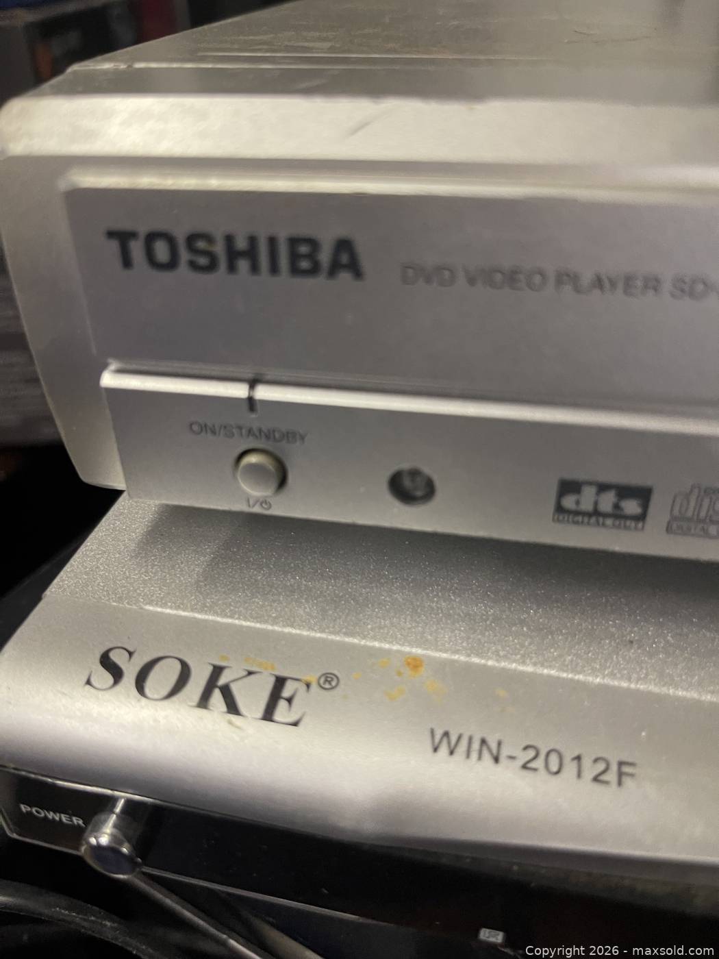 Toshiba SD-310VU and Soke WIN-2012F DVD players | Maxsold