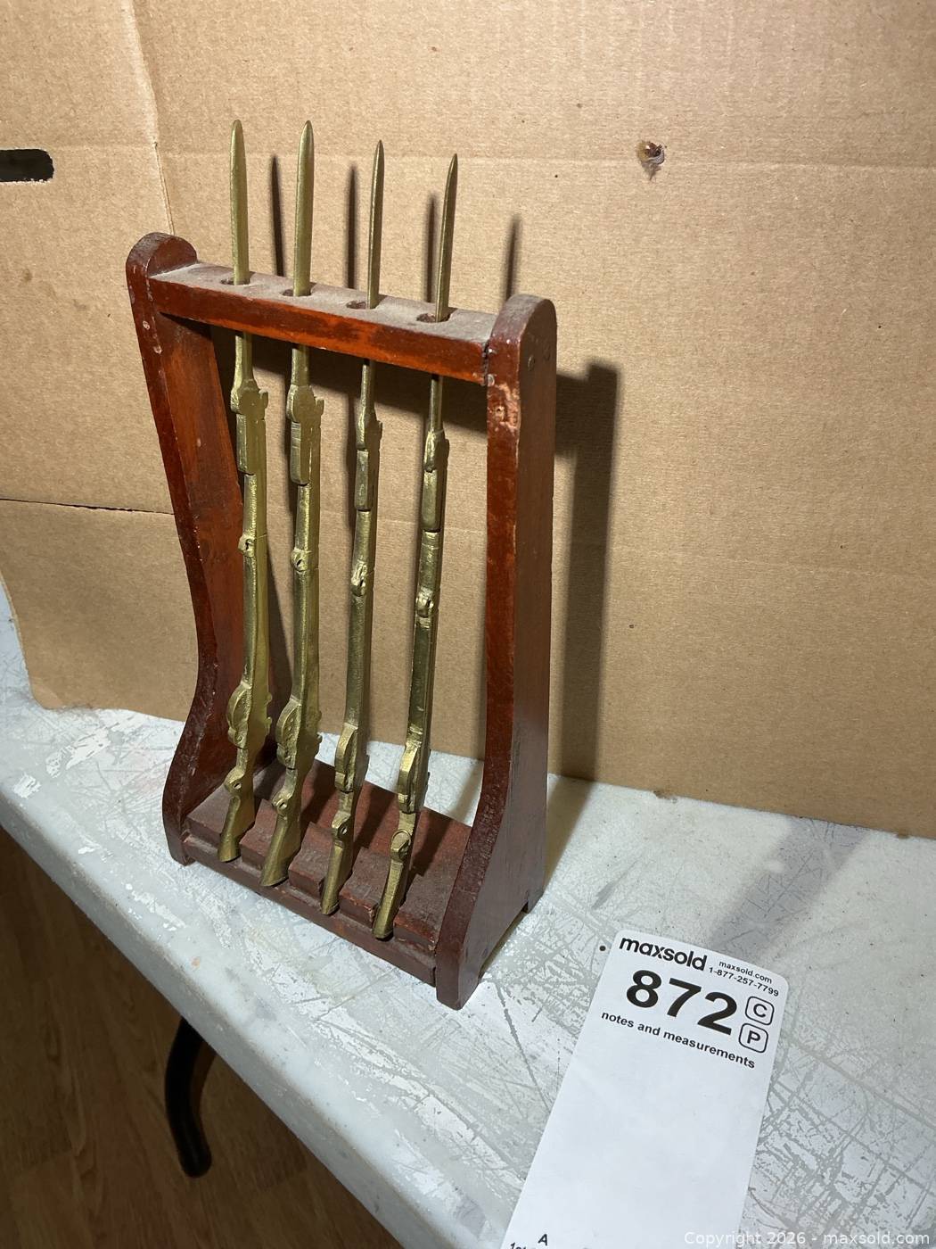 Solid brass rifle motif letter openers with wooden stand | Maxsold
