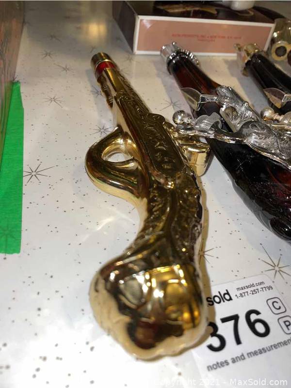 Six Avon Collectible Firearms Cologne Bottles | Maxsold
