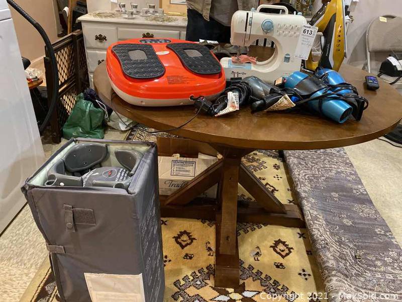Hair Dryers, Foot Massager, Iron, Sewing Machine, and Pack n Play | Maxsold