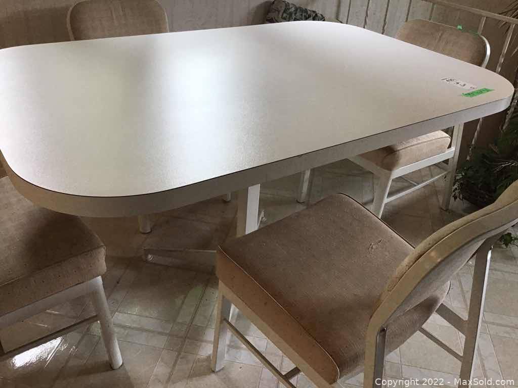 Melamine Table with 4 Metal Frame Chairs | Maxsold