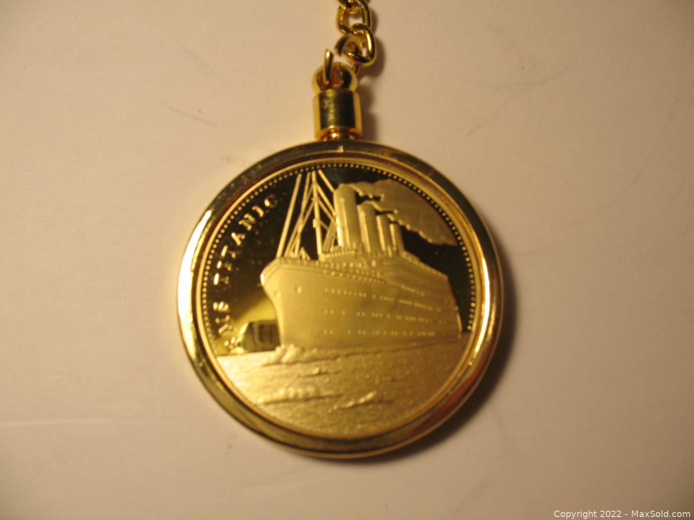 Gold Plated RMS Titanic Commemorative Keychain with Medal | Maxsold