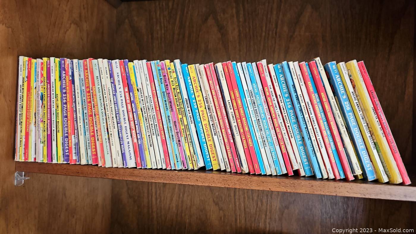 Mad, Archie, Richie Rich Comics and Family Circus Books Lot | Maxsold