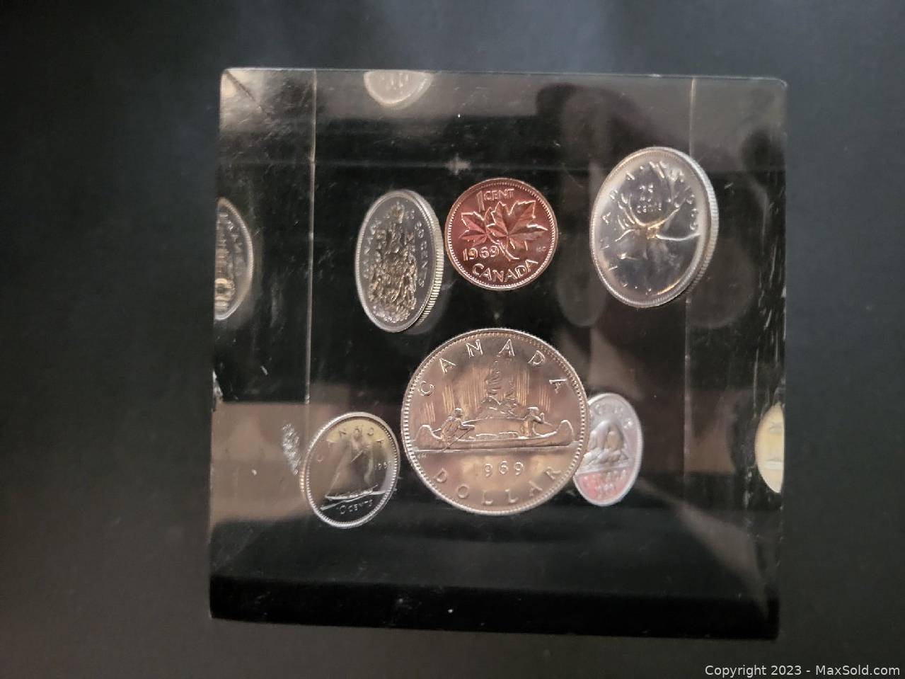 Set of Six Lucite Canadian Coin Paperweight Cubes | Maxsold
