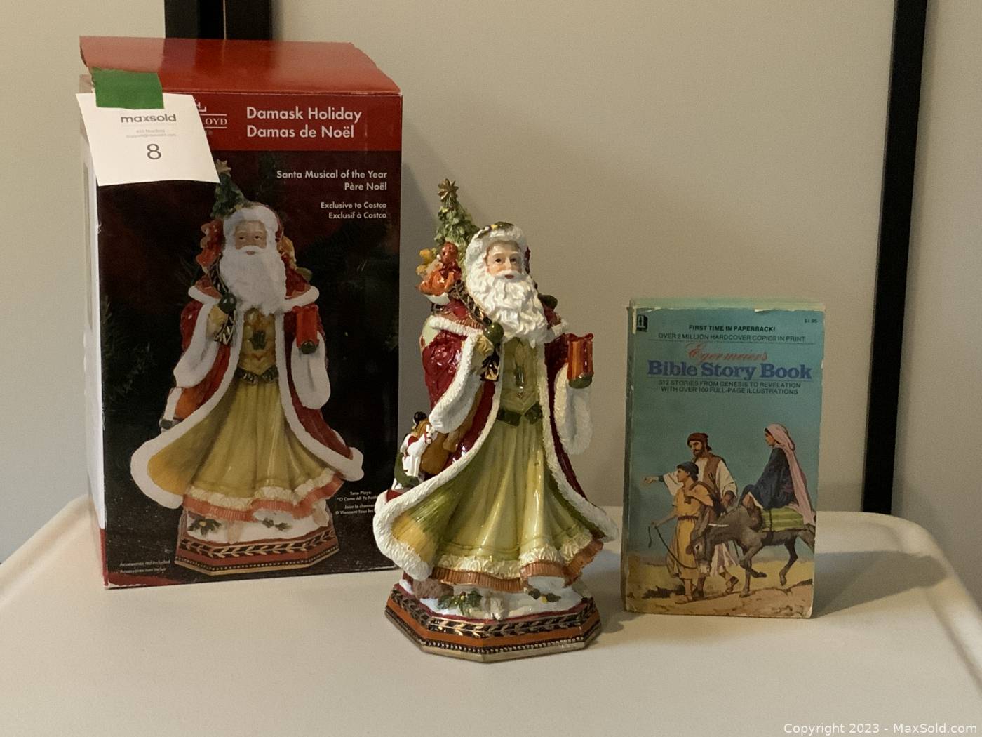 Santa Figurine with Box and Bible Story Book | Maxsold