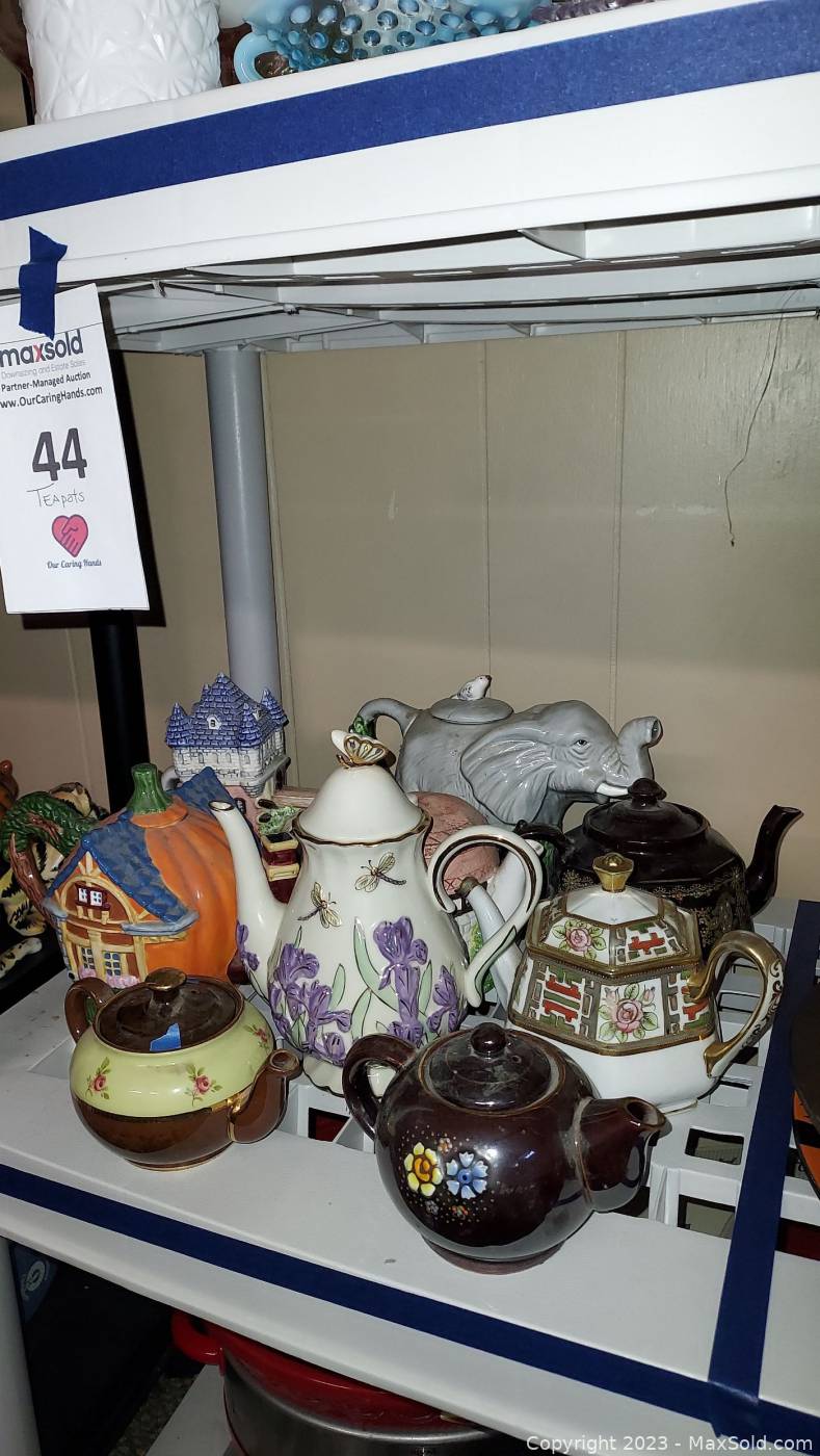 Collection of Decorative Teapots and Figurines | Maxsold