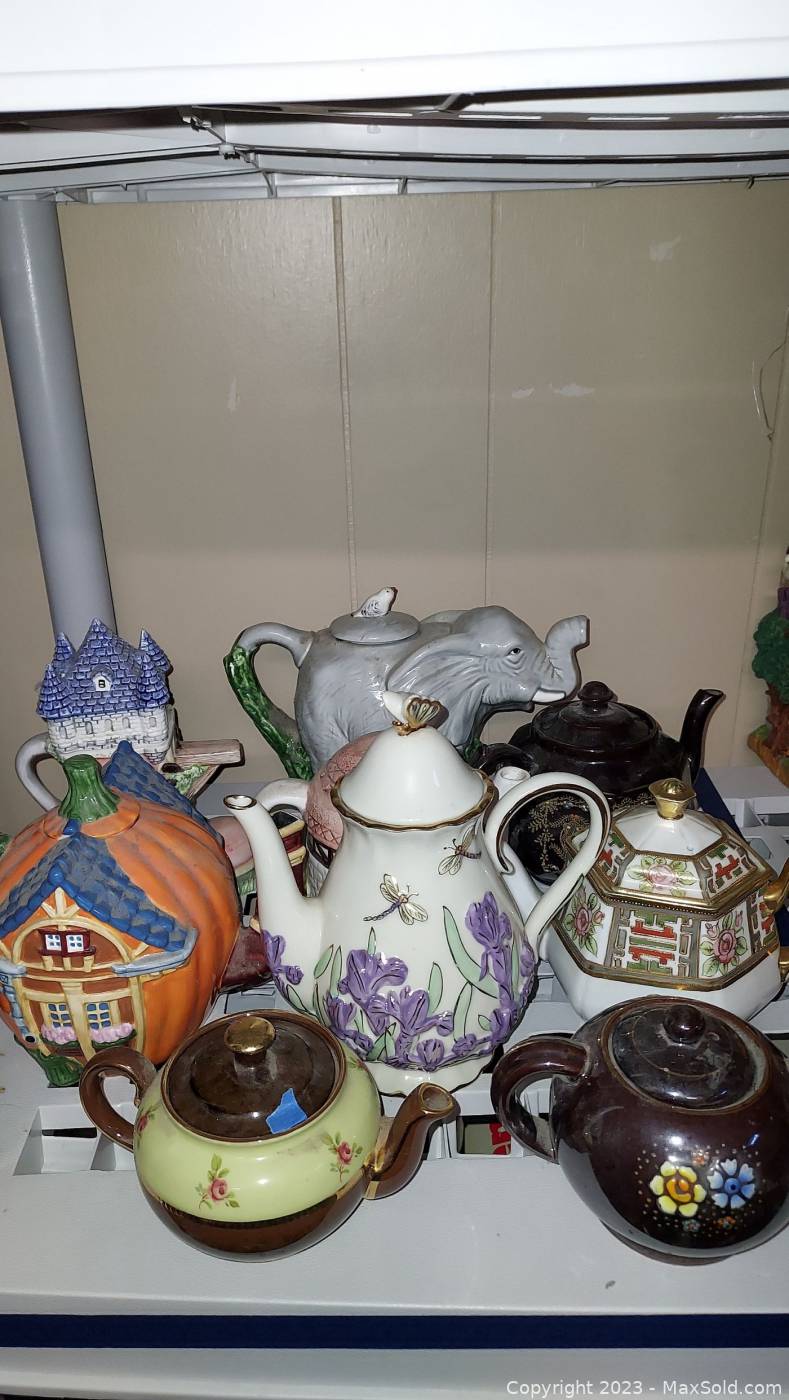 Collection of Decorative Teapots and Figurines | Maxsold